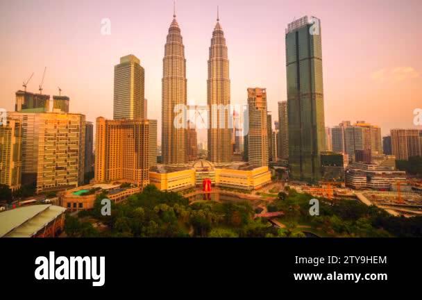 City skyline time lapse, with the Petronas Twin Towers and the KLCC ...