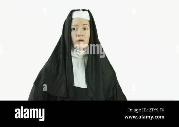 Nun praying with lord cross sign Stock Video Footage - Alamy