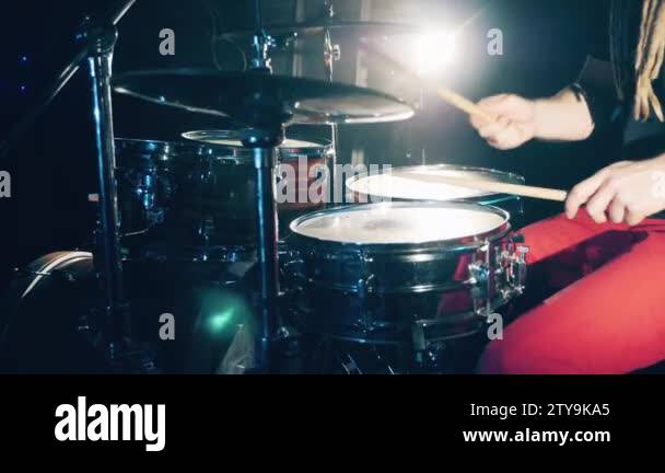 Drum set is being shown in a side view while being played Stock Video ...