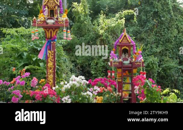 Wooden miniature guardian spirit house. Small buddhist temple shrine ...