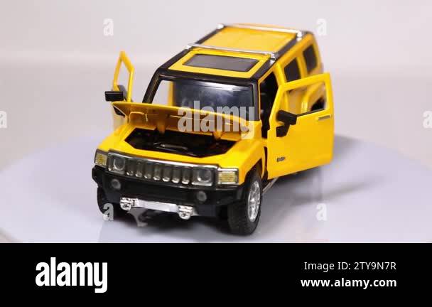 BERLIN, GERMANY - JANUARY. 2019: Yellow Hummer H3 scale model SUV car ...