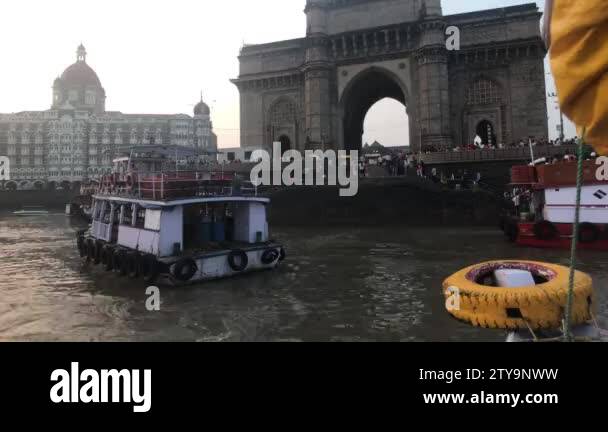 Mumbai, India - November 10, 2019: Arabian Sea tourists meet ships under the monument gate to ...