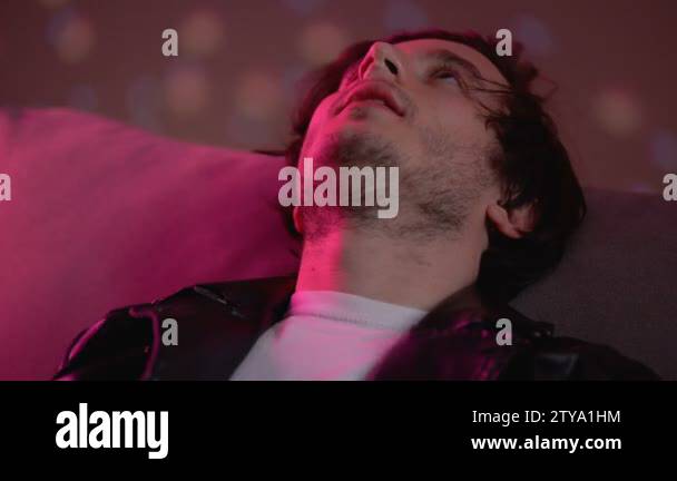 Male drug addict snorting cocaine at rave party, relaxing in nightclub ...