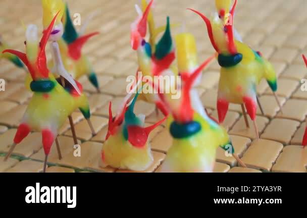 Tohe, the traditional toys in Vietnam made by colored rice powder Stock ...