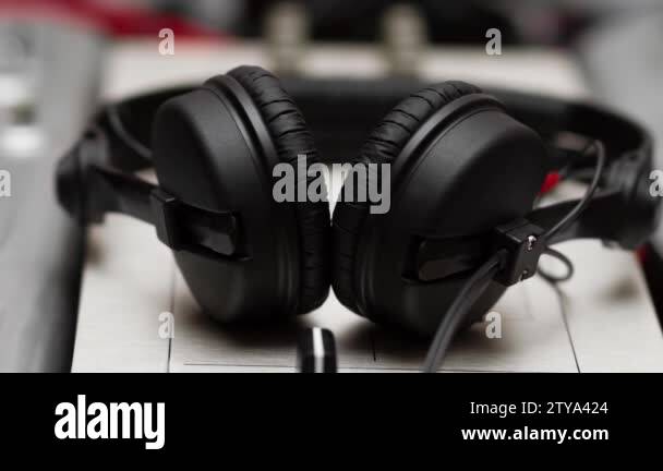 Footage of dj headphones to mix music at night club party,concert ...