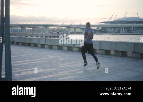 Man running on city Stock Videos & Footage - HD and 4K Video Clips - Alamy