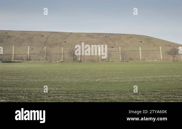 Garbage dump, landfill of municipal waste with protective net on steel ...