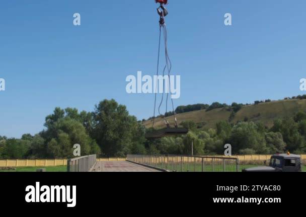 On a summer day, the green part of the bridge rises carefully and ...