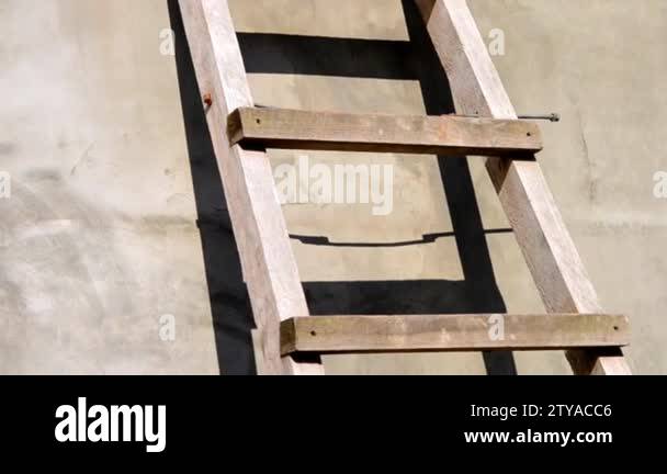 Wooden ladder ladder Stock Videos & Footage - HD and 4K Video Clips - Alamy