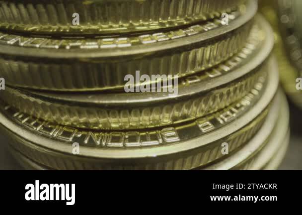 Stacks of Bit Coins. Wide macro lens extreme close up (ECU) moving past ...