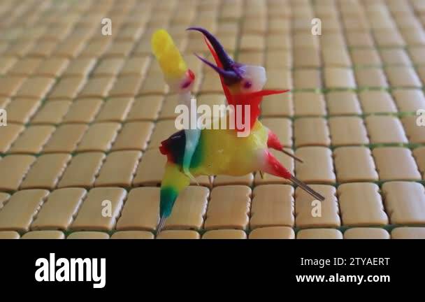 Tohe, the traditional toys in Vietnam made by colored rice powder Stock ...
