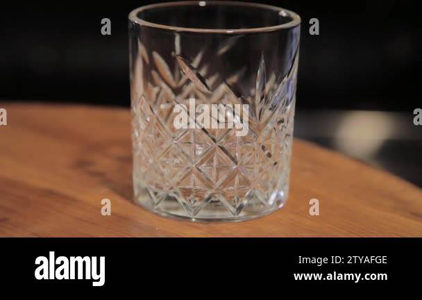 Cocktail shaker and beaker for preparation beverages on bar counter in ...