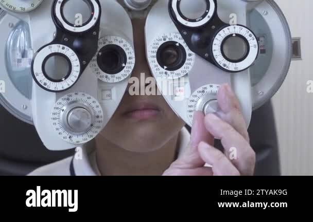 Little boys eye examination at optometrist ophthalmologist using ...