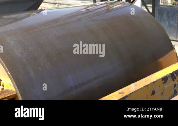 Construction Vehicle Steam Roller Close Up - Slow Motion. Asphalting ...