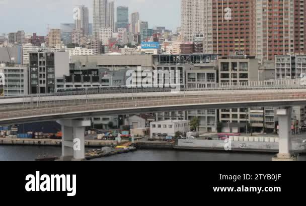 Metro in Tokyo on ramp to the Rainbow BRidge Stock Video Footage - Alamy
