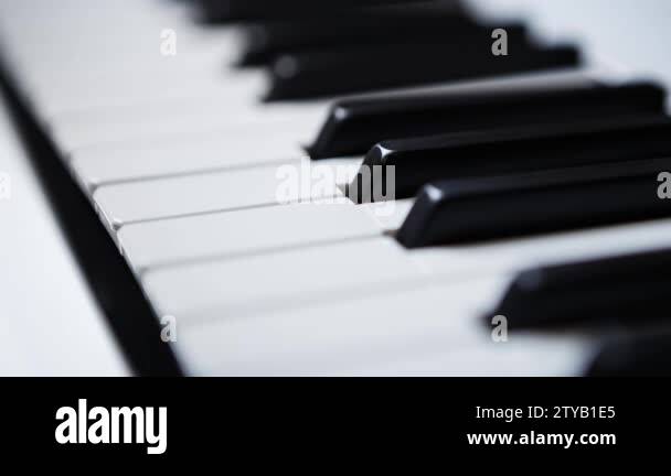 Midi keyboard keys in focus. Digital piano deck for musician. Play ...