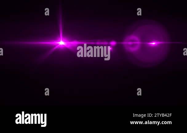 Purple digital lens flare with bright light in black background used ...