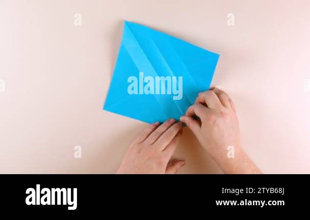 folding origami shark time lapse video Stock Video Footage - Alamy