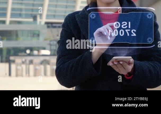 Woman interacts HUD ISO 27001 Stock Video Footage - Alamy