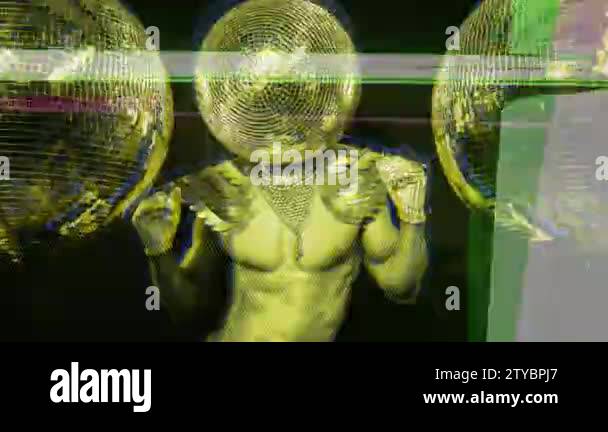 Muscular man dancing with disco ball on head Stock Video Footage - Alamy