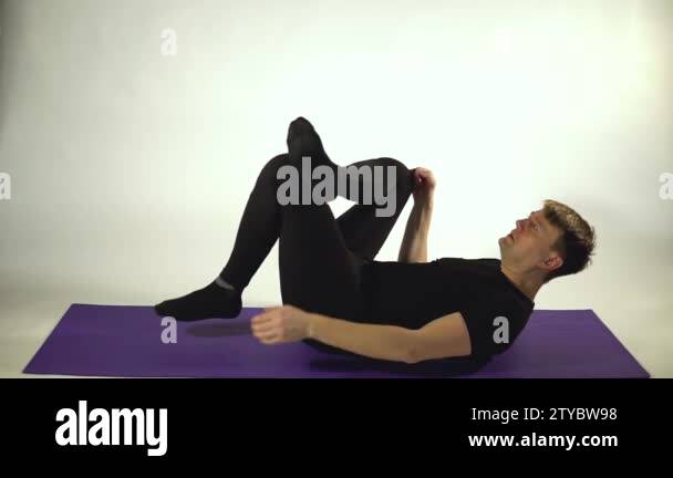 The most stretched man in fitness, does a heel on his knee Stock Video ...
