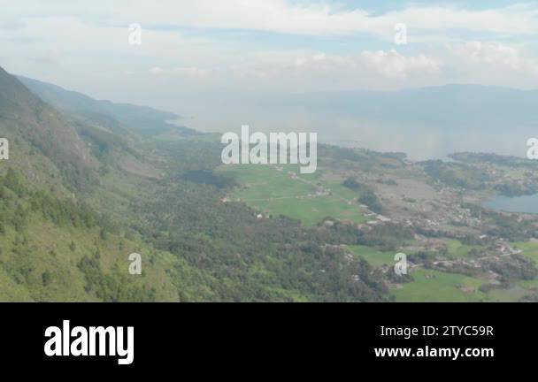 Aerial: lake Toba and Samosir Island from above Sumatra Indonesia. Huge ...
