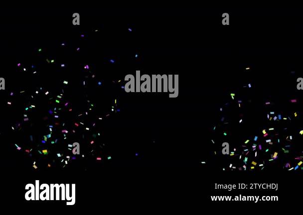 Confetti salute exploding in air on isolated black background. Visual ...
