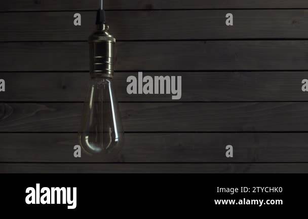 Real Edison light bulb flickering. Vintage filament Edison light bulb ...