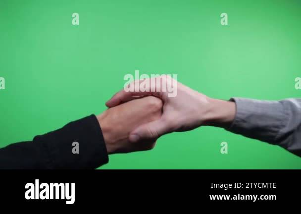Rock paper scissors hand game. Two hands bottom side view. Green screen ...