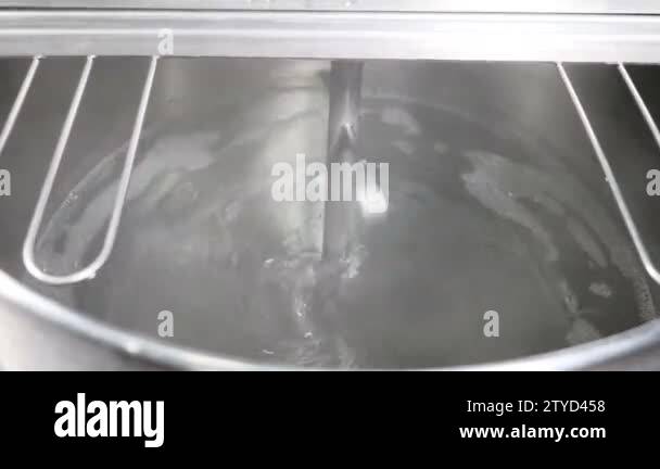 Technological part of beer production at brewery. Steel reservoir with ...