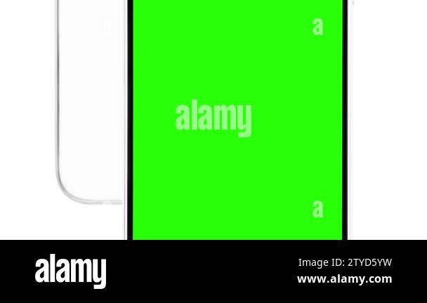 Footage of modern no name white smart phone device with green chroma ...