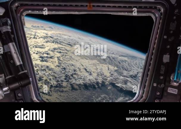 Earth as seen through window of International Space Station ISS . Elements of this image ...