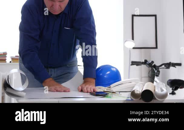 Calm engineer looking drawing Stock Videos & Footage - HD and 4K Video ...
