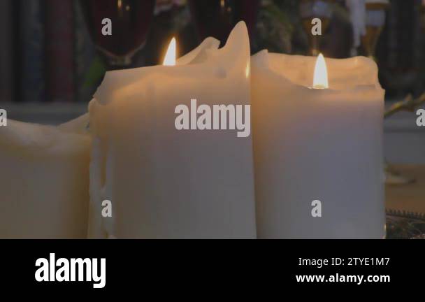 Two memory Candles burn in the dark. The fire of hope and spirituality ...