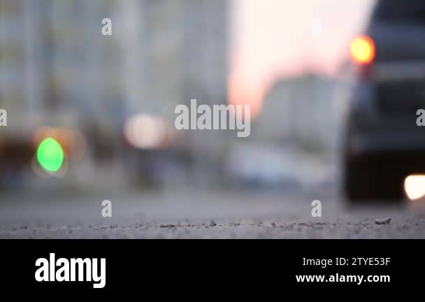 Woman driver putting an emergency stop sign behind broken blurred car ...