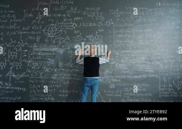 Crazy scientist writing formulas on chalkboard then shouting beating ...