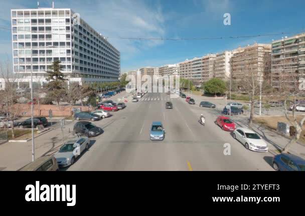 Elevated view of cars day time lapse on a city highway. Drivers in ...