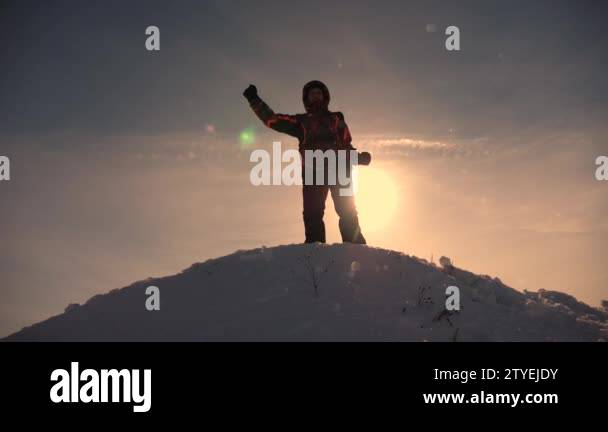 Mountaineer Journey to mountains in winter. Traveler climbs a mountain ...