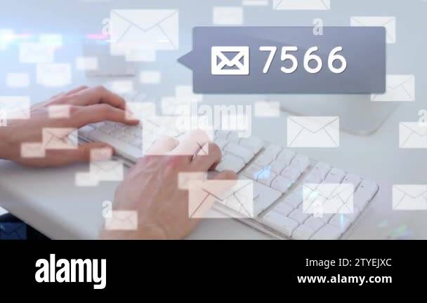 Close up of hands typing on a keyboard. Beside it is a digital ...