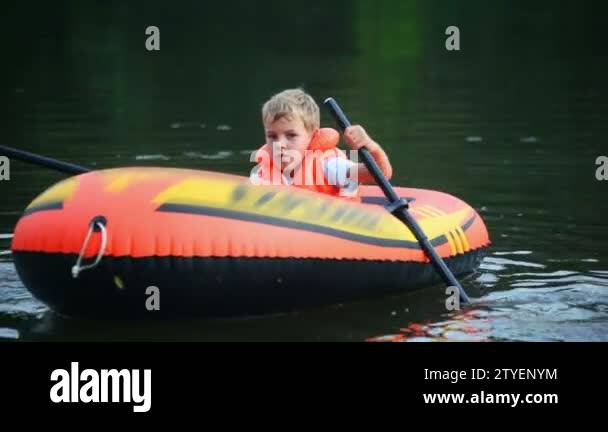 Boy inflatable water Stock Videos & Footage - HD and 4K Video Clips - Alamy