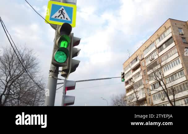 Traffic lights red, yellow, green, green arrow. Sign give way ...