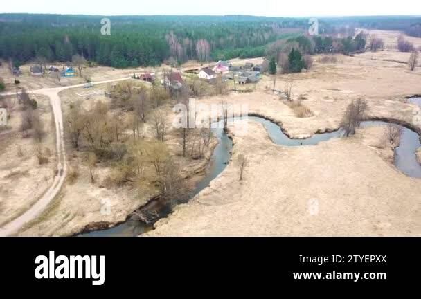 Rural landscape in april. Small River Sula in early spring. Aerial view ...