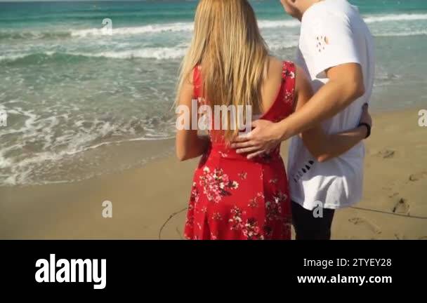 Couple standing cuddling beach Stock Videos & Footage - HD and 4K Video ...