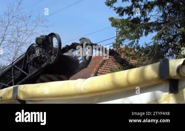 Cold Planer Machine Loading Milled Asphalt into Dump Truck. Asphalt ...
