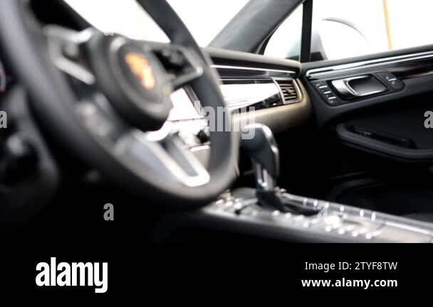 Dashboard, wheel,shift(gear) lever and detail of logo - Porsche SUV ...