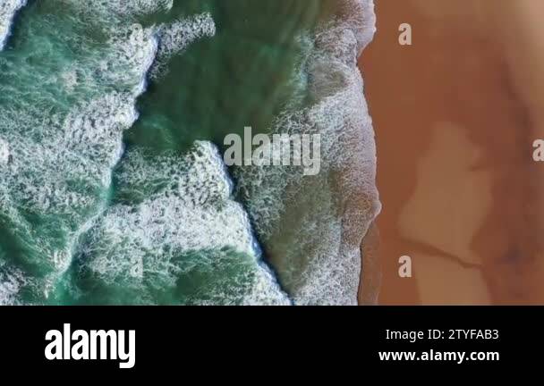 Tropical beach aerial view, Top view of waves break on tropical yellow ...