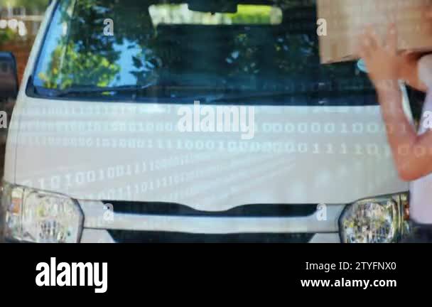 Close up of a deliveryman giving a thumbs up while carrying a package ...