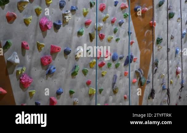 Empty indoor climbing wall in a bouldering climbing center Stock Video ...