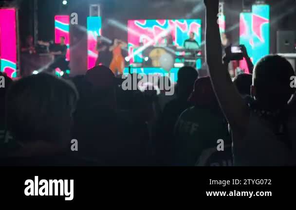Slow Motion Video Background Happy Audience Jumping Raisies Hands Rock ...