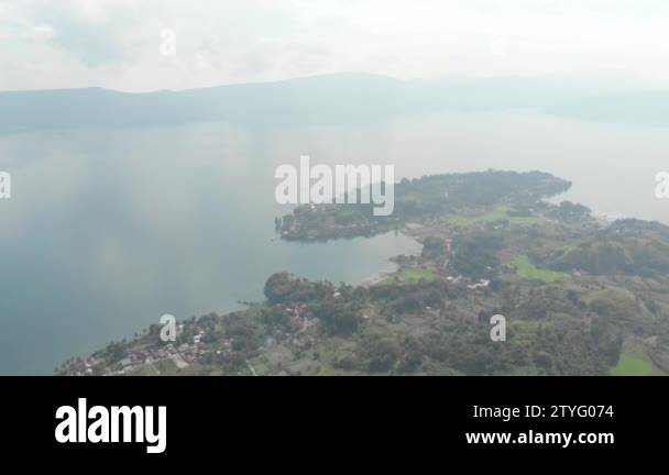 Aerial: lake Toba and Samosir Island from above Sumatra Indonesia. Huge ...